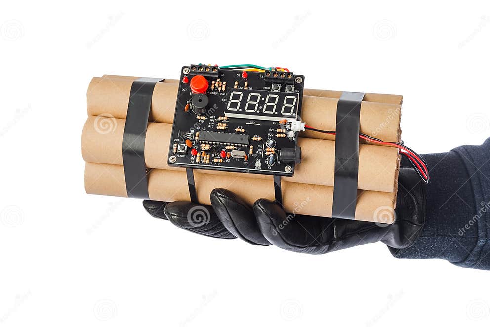 Hand with dynamite bomb stock photo. Image of blast - 129743340