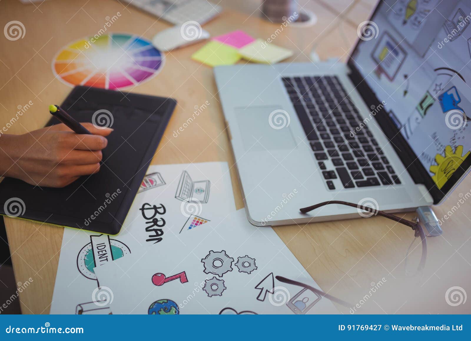 Hand of Editor Using Digitizer by Laptop on Desk in Office Stock Image ...