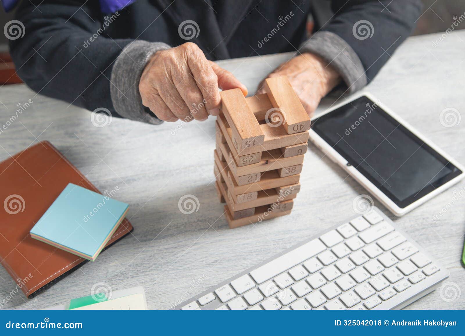 Hand of Elderly Woman Stacking Wooden Blocks Stock Photo - Image of ...