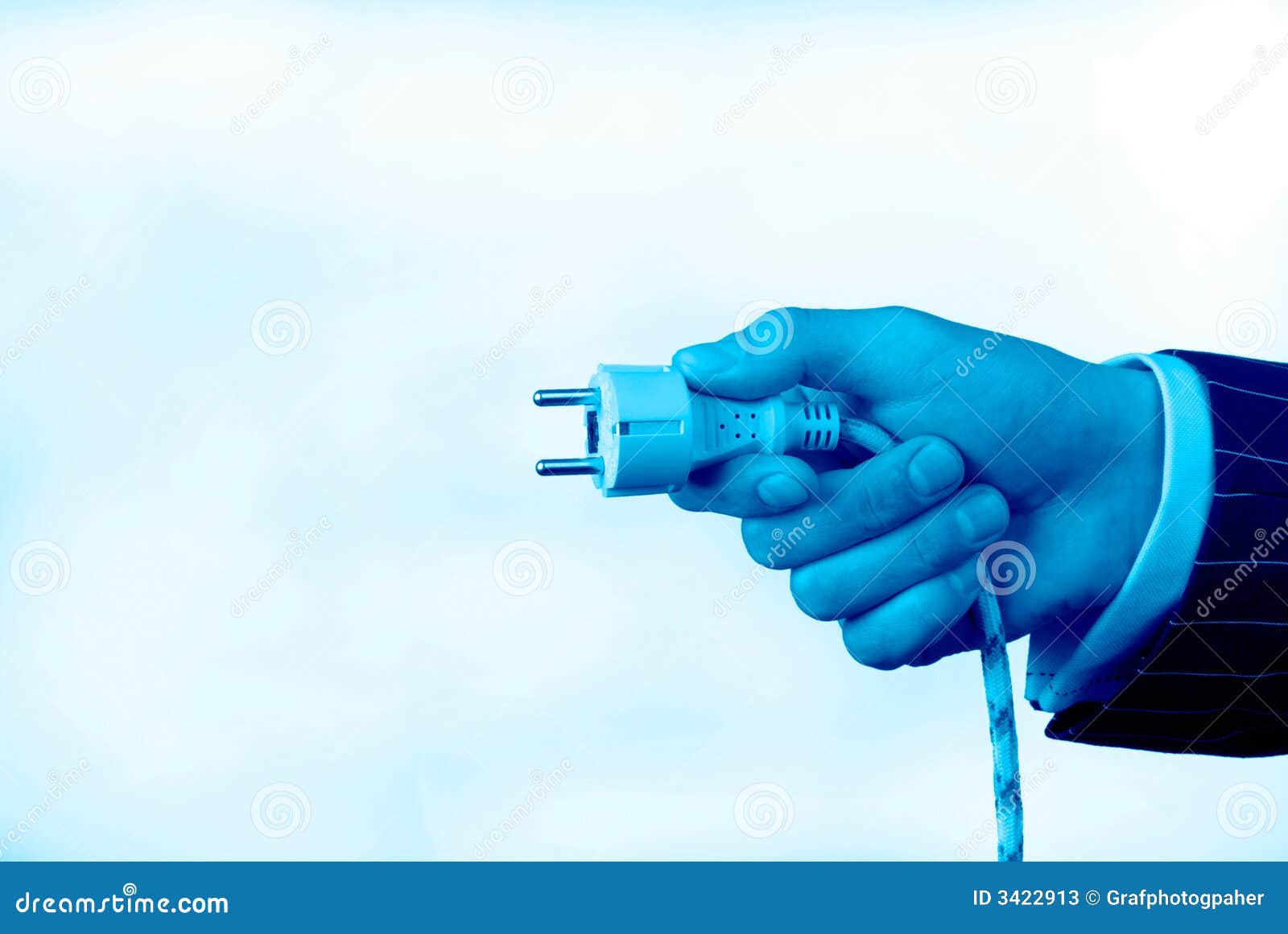 Hand with an electric plug stock image. Image of technology - 3422913