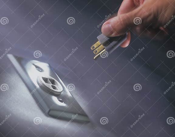 Hand with Electric Plug and Outlet Stock Image - Image of person ...