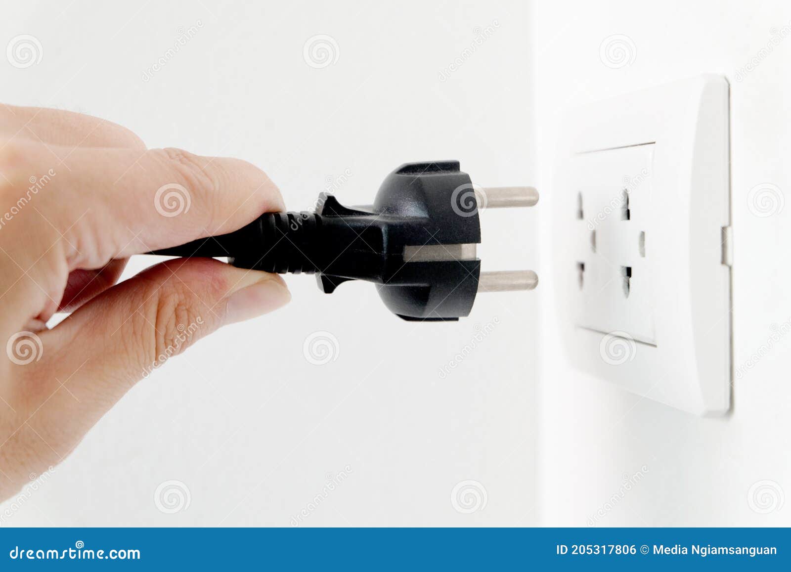 Hand of Electrical Appliances he Was Pulling the Plug. Out of the Plug ...