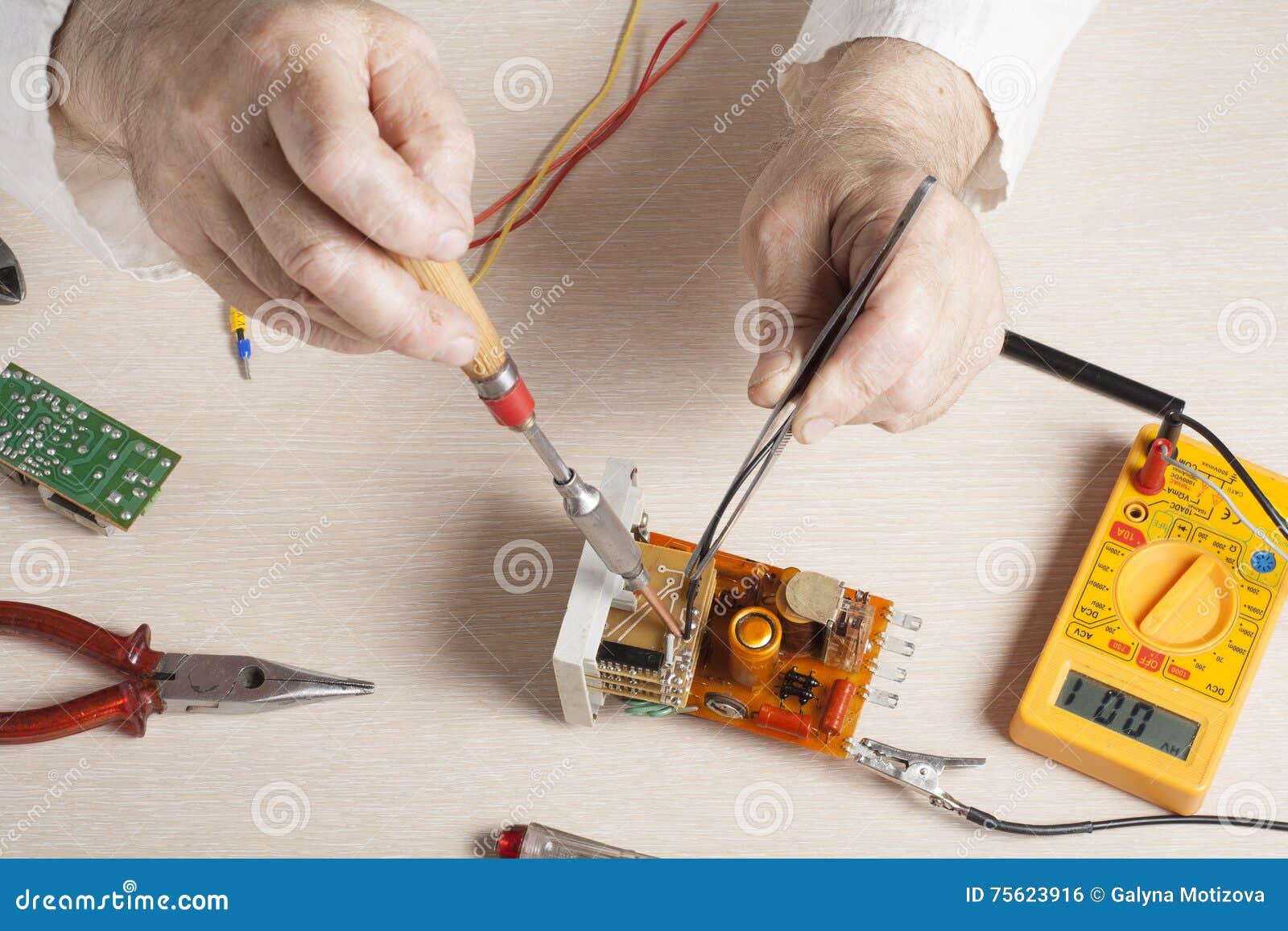 Hand of Electrician with Multimeter Probe at Electrical Switchgear ...