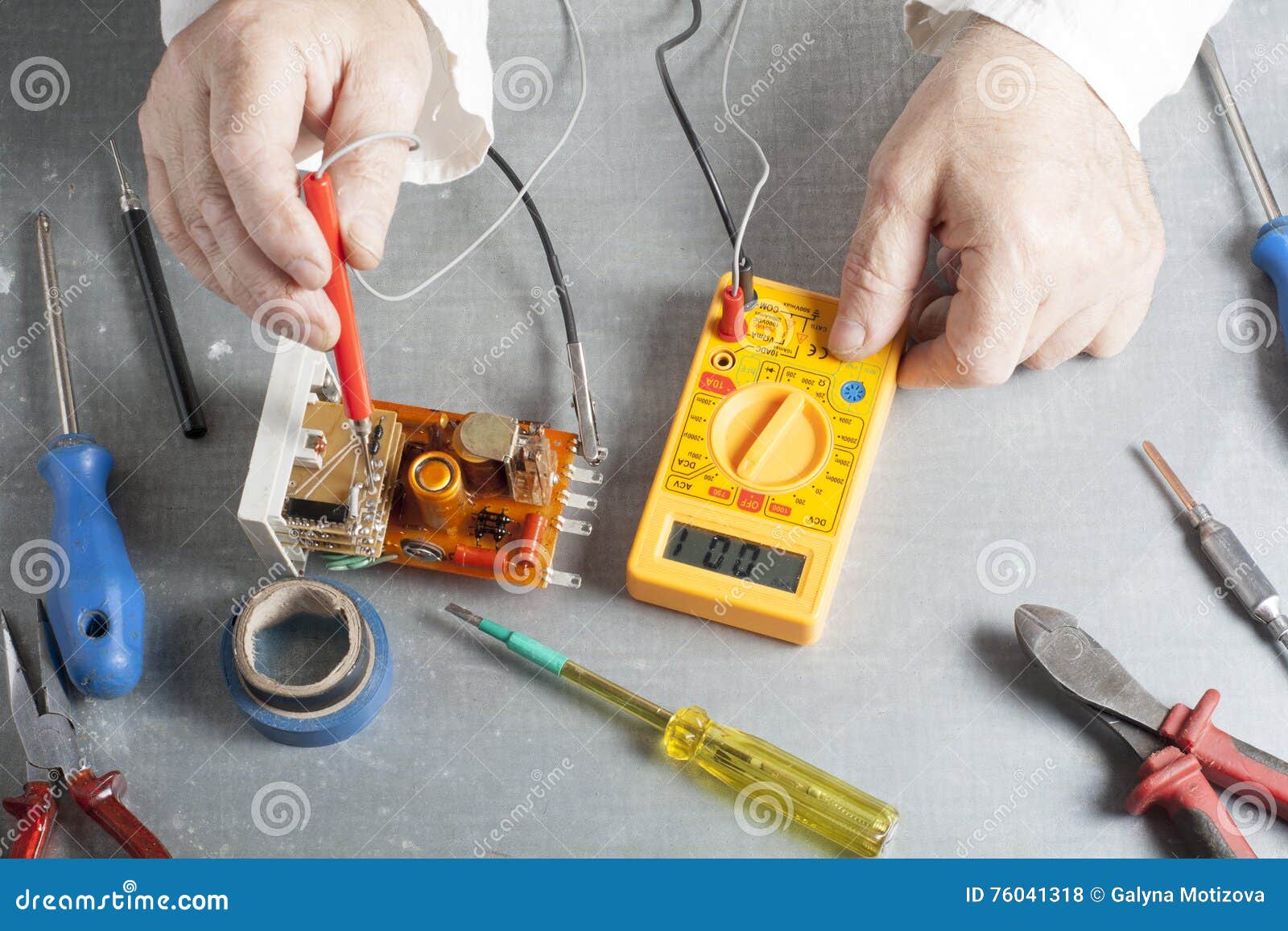 Hand of Electrician with Multimeter Probe at Electrical Switchgear ...