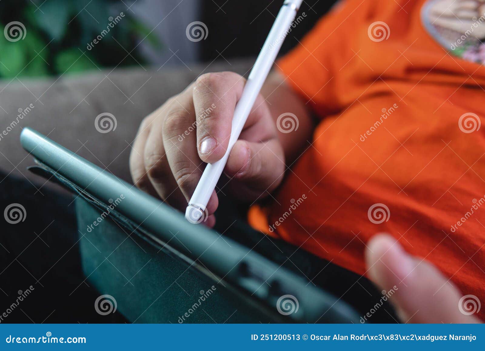 A Hand with an Electronic Brush Writing on a Tablet Stock Image - Image ...