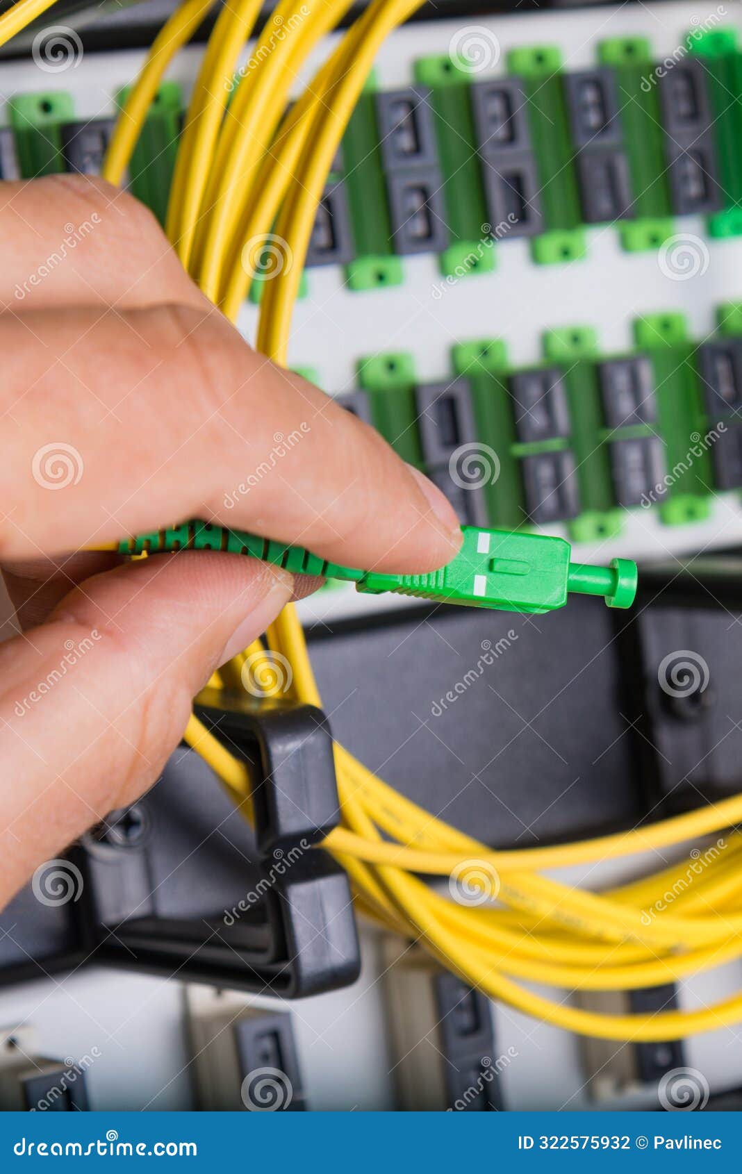 Hand of Engineer Plugging in Ethernet Cable into Server Switch P Stock ...