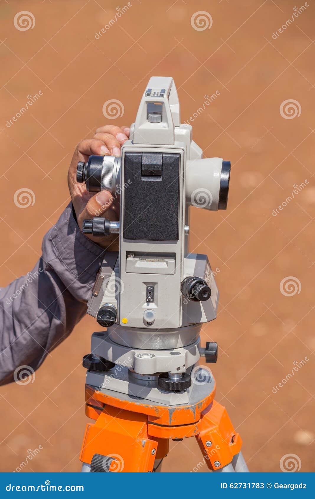 Hand of Engineer Use Tacheometer or Theodolite for Survey Line C Stock ...