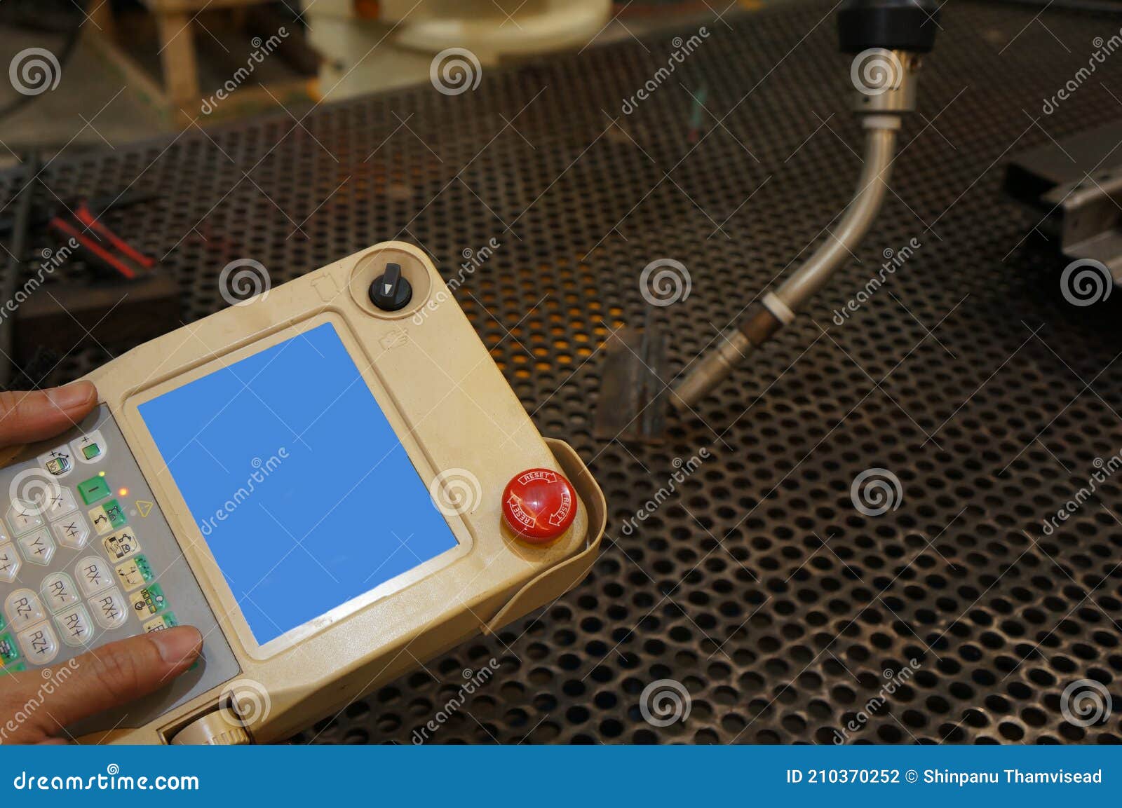 Hand of the Engineers are Using Remote Control Robotic Welding. New Era ...