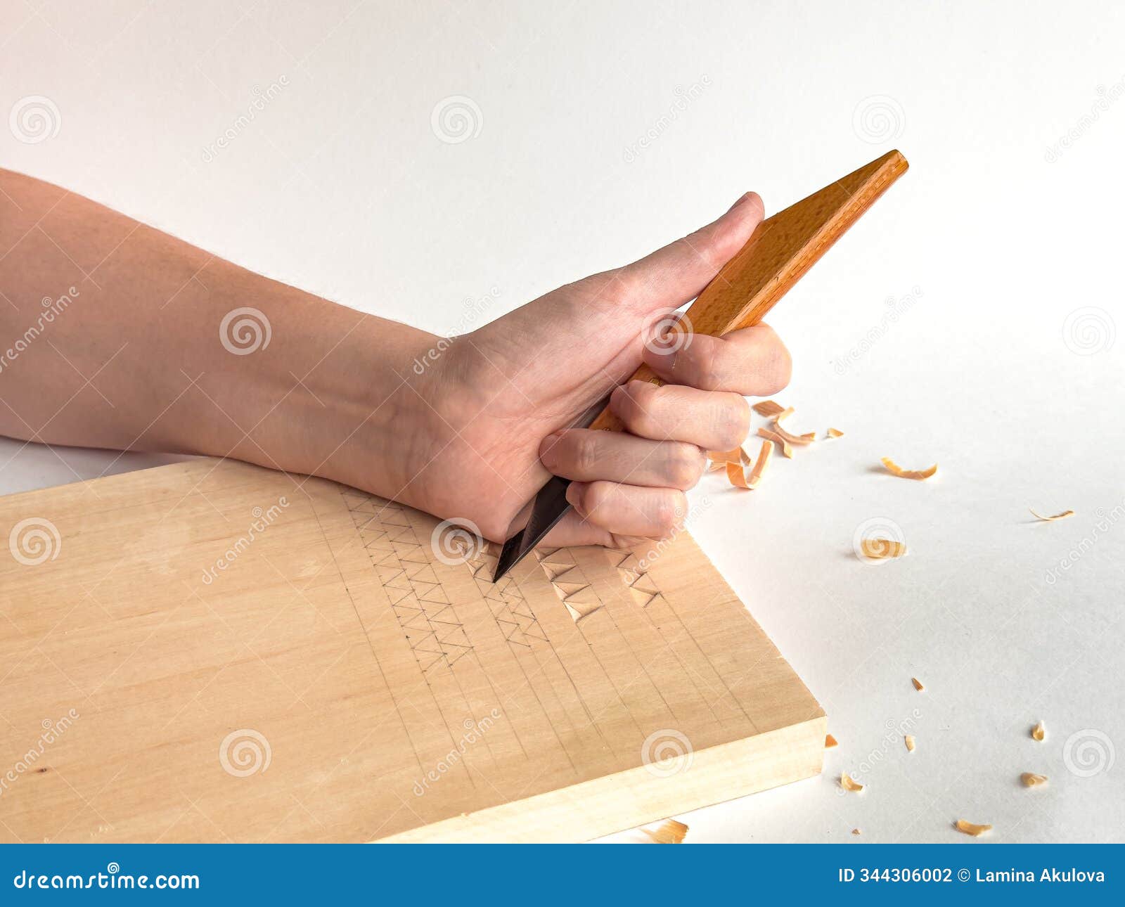 Hand Engraving Wood with Chisel, Artistic Craftsmanship in Action Stock ...