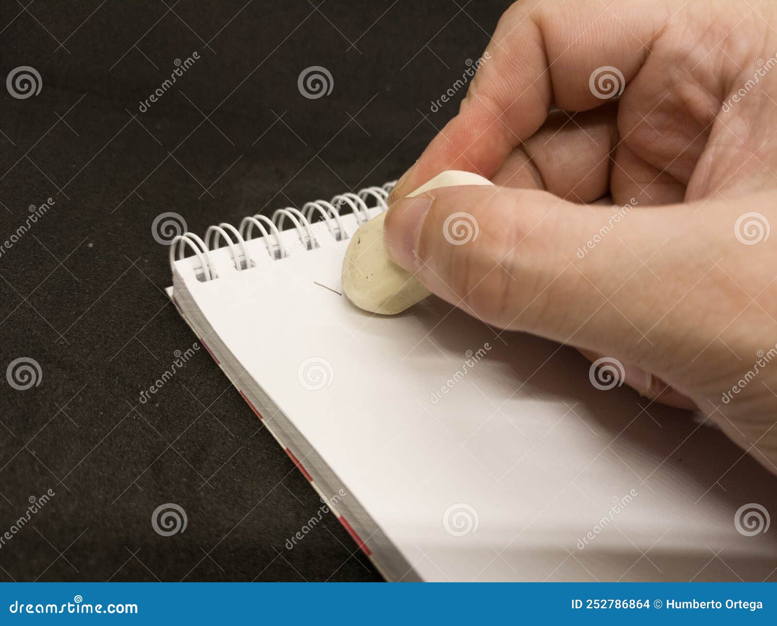 Erasing on paper close up stock photo. Image of close - 252786864