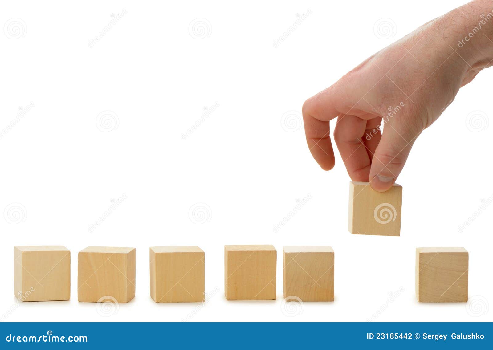 The Hand Establishes a Wooden Cube in Row Stock Photo - Image of learn ...