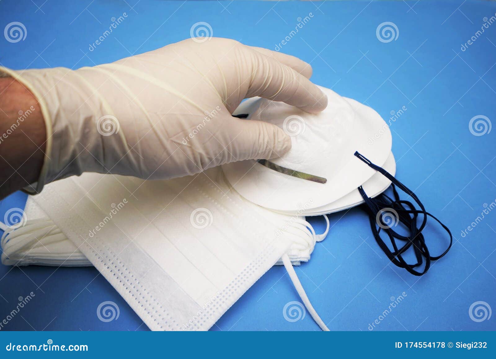 Hand and Face Mask on Blue Background Stock Photo - Image of care ...