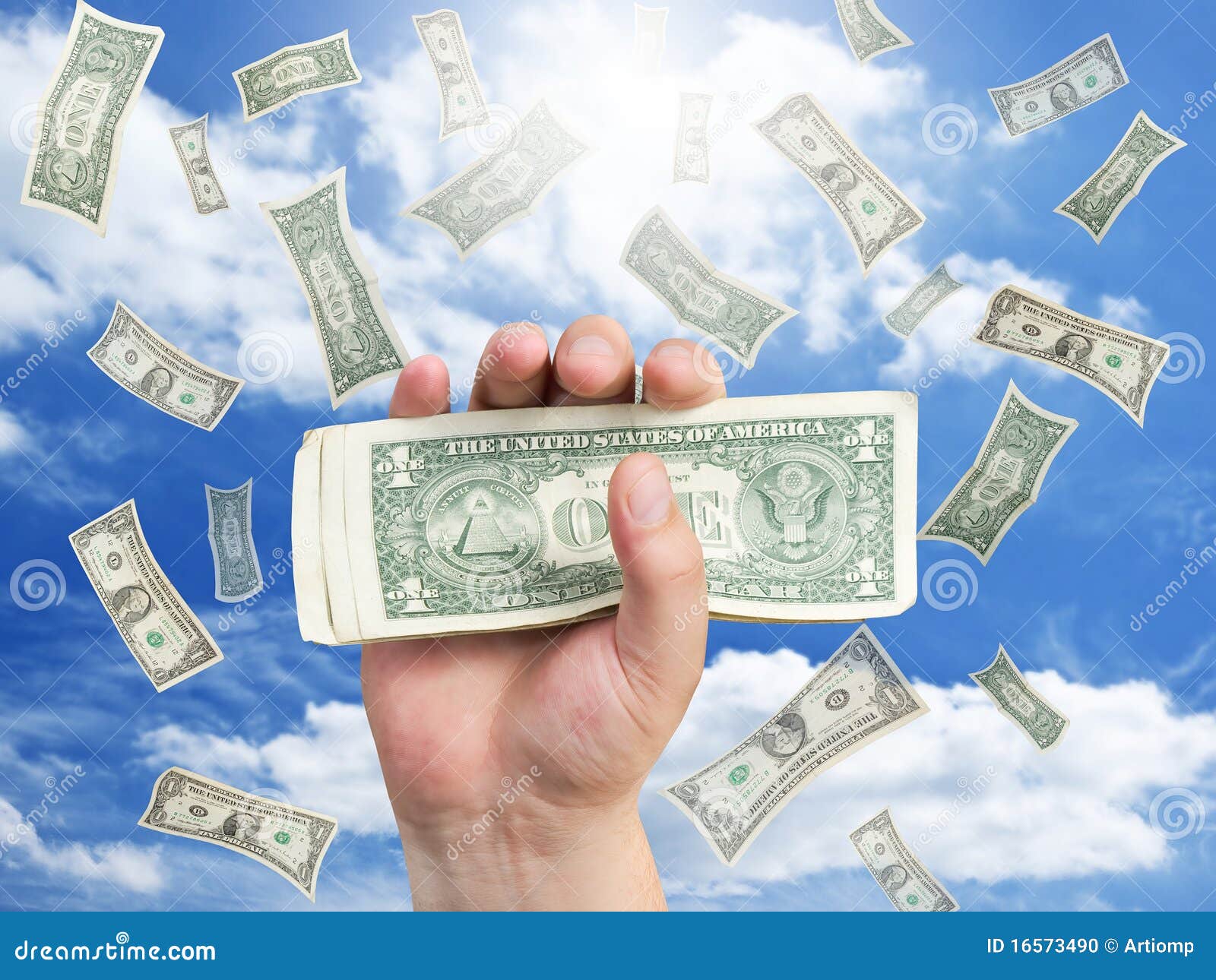 Hand and falling money stock photo. Image of investment - 16573490