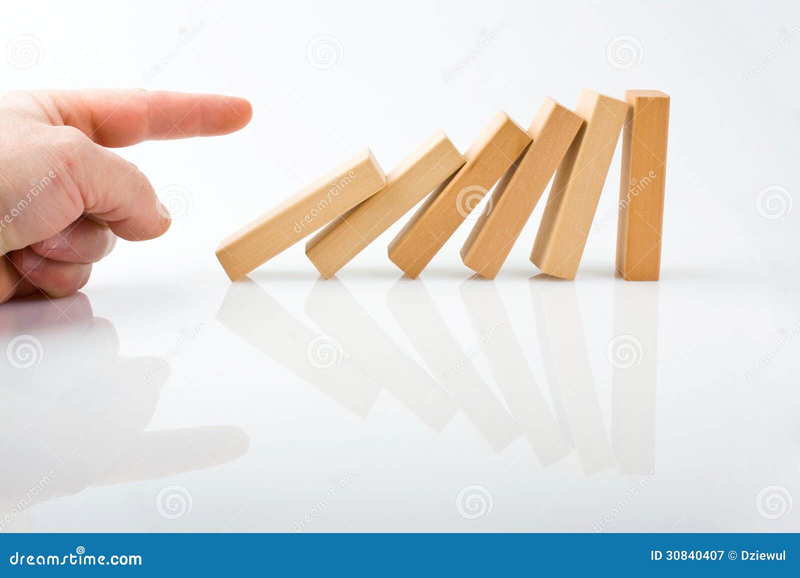 Hand and falling pieces stock image. Image of finger - 30840407