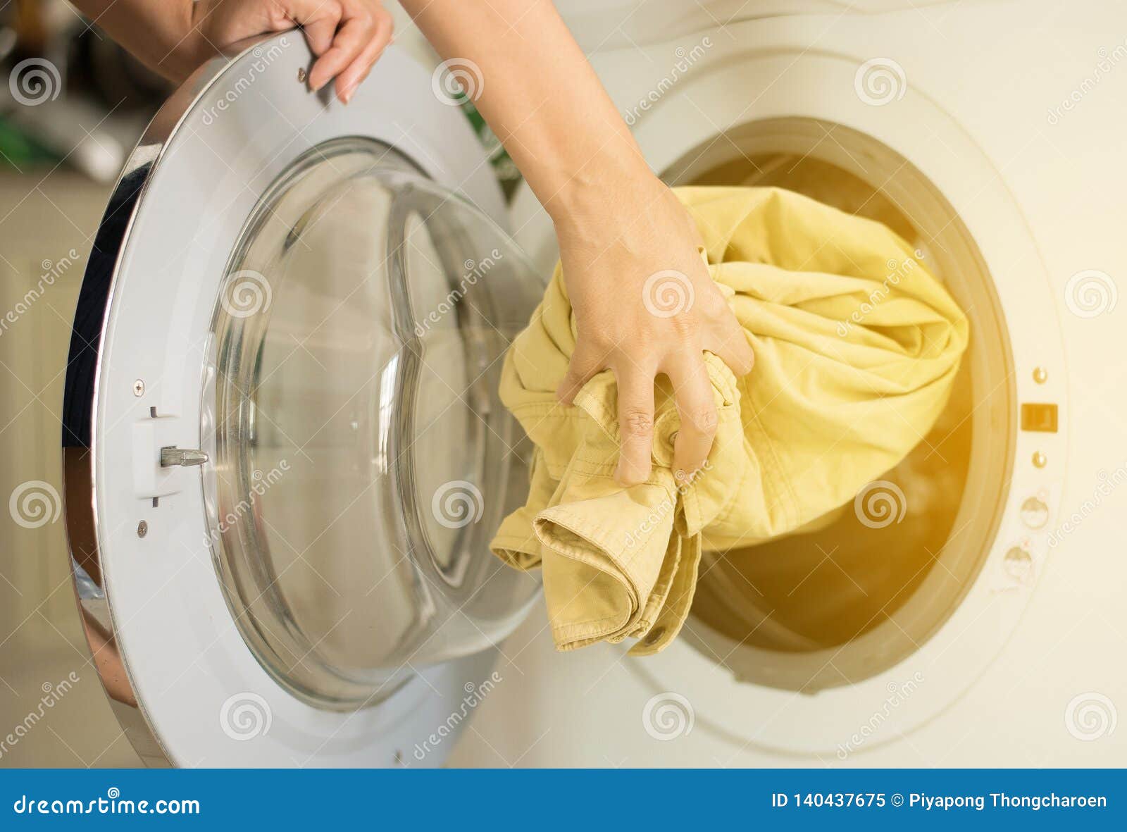 Hands Female Getting in Dirty Clothes into Washing Machine Doing ...