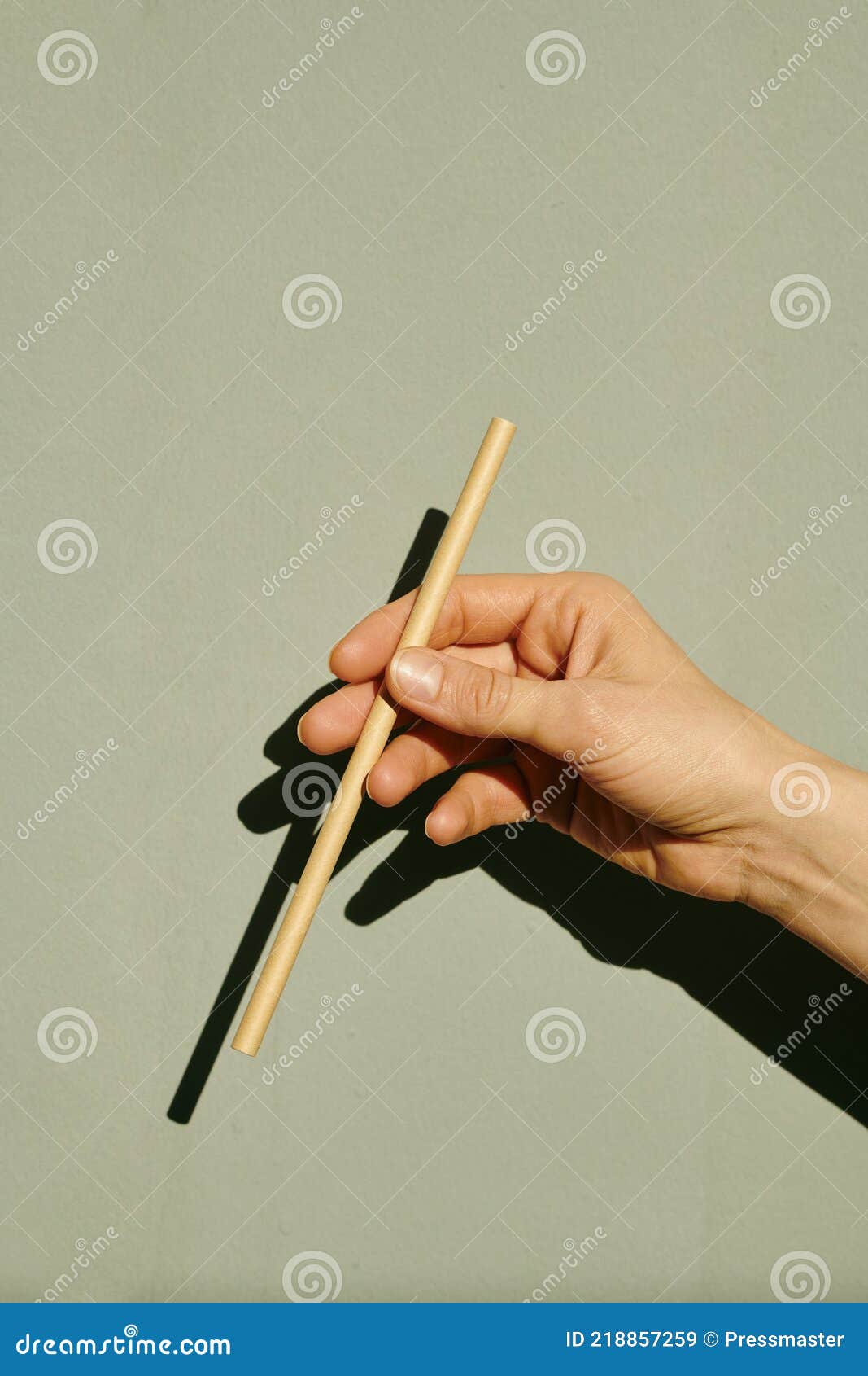 Hand of Female Holding Stick in Front of Camera Stock Image - Image of ...