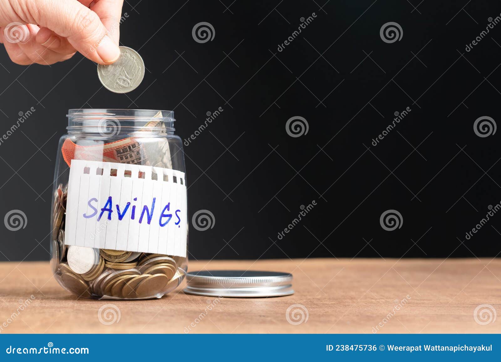 Hand Fill a Money Coin into the Bottle Stock Photo - Image of light ...