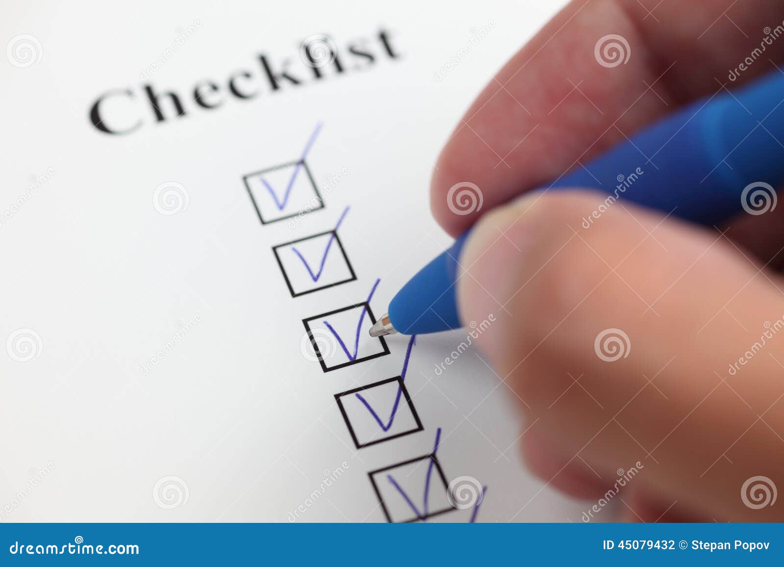 Hand filling a checklist stock photo. Image of ballpoint - 45079432