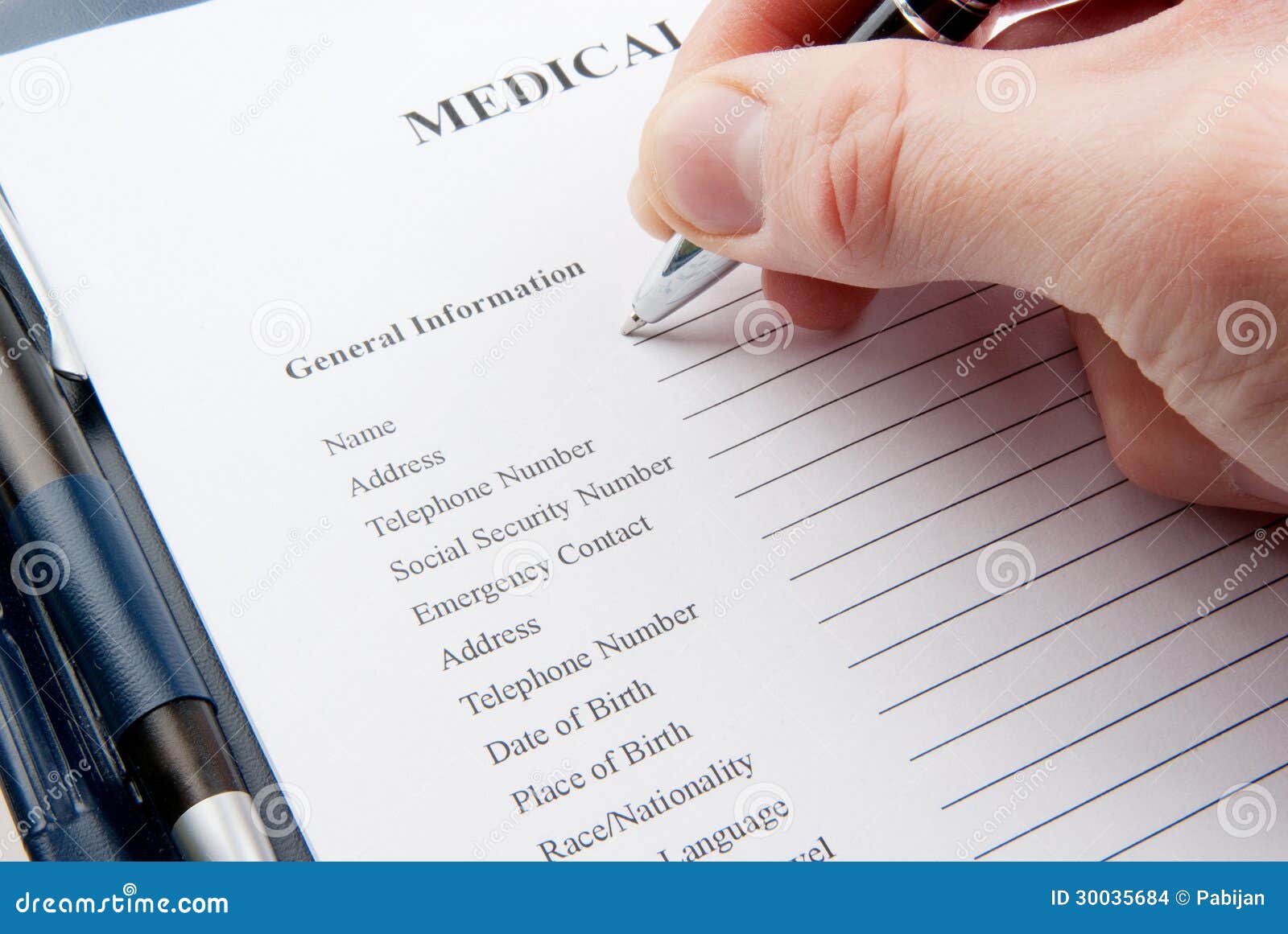 Hand Filling in Empty Medical Questionnaire Stock Photo - Image of ...