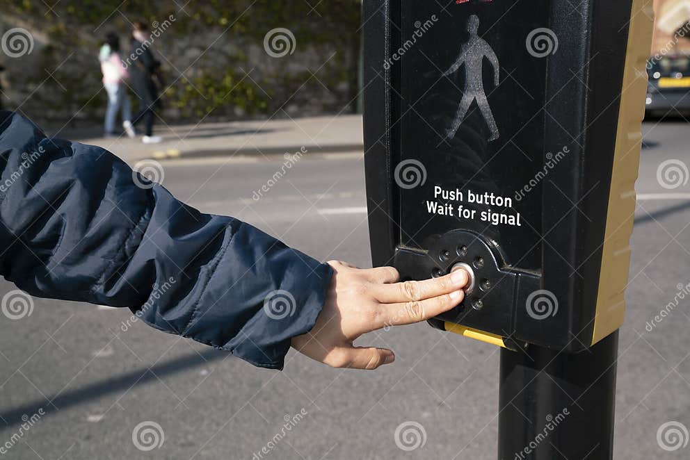 Hand Finger Pressing or Pushing on Stop Request Button at Crosswalk ...