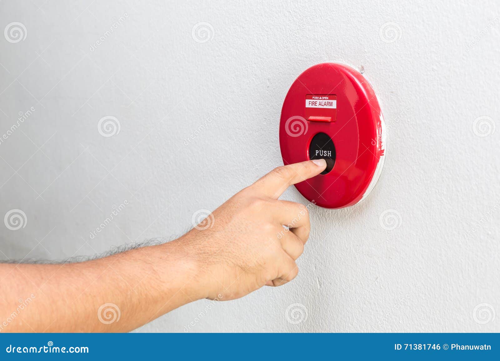 Hand with Finger Pressing Red Fire Alarm on the Wall Stock Photo ...