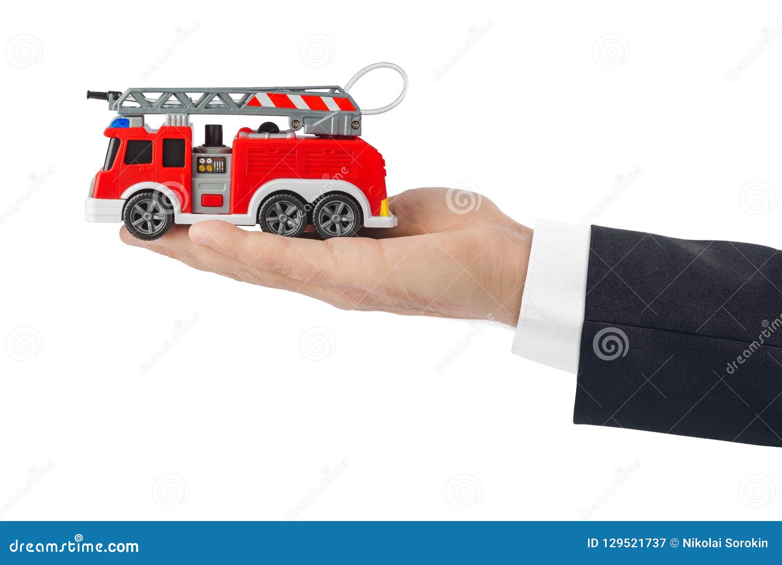 Hand with fire truck stock image. Image of caucasian - 129521737