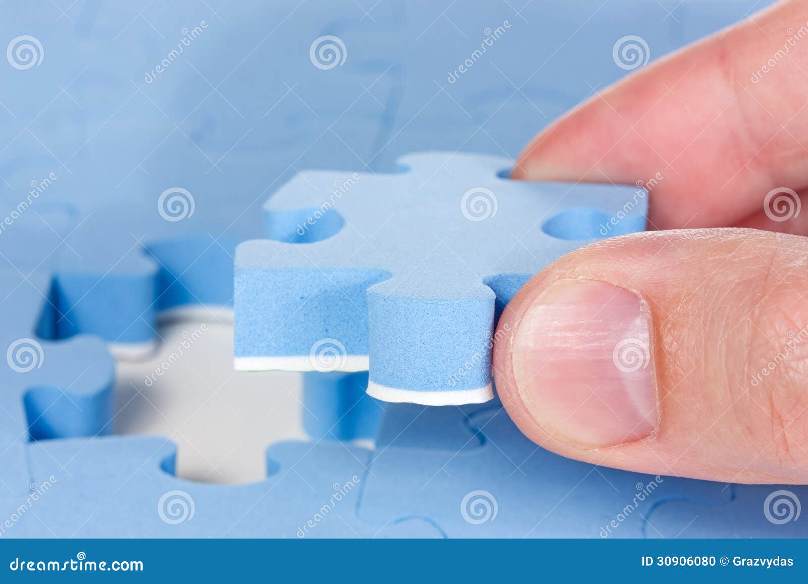Hand Fitting the Last Puzzle Piece Stock Photo - Image of success ...