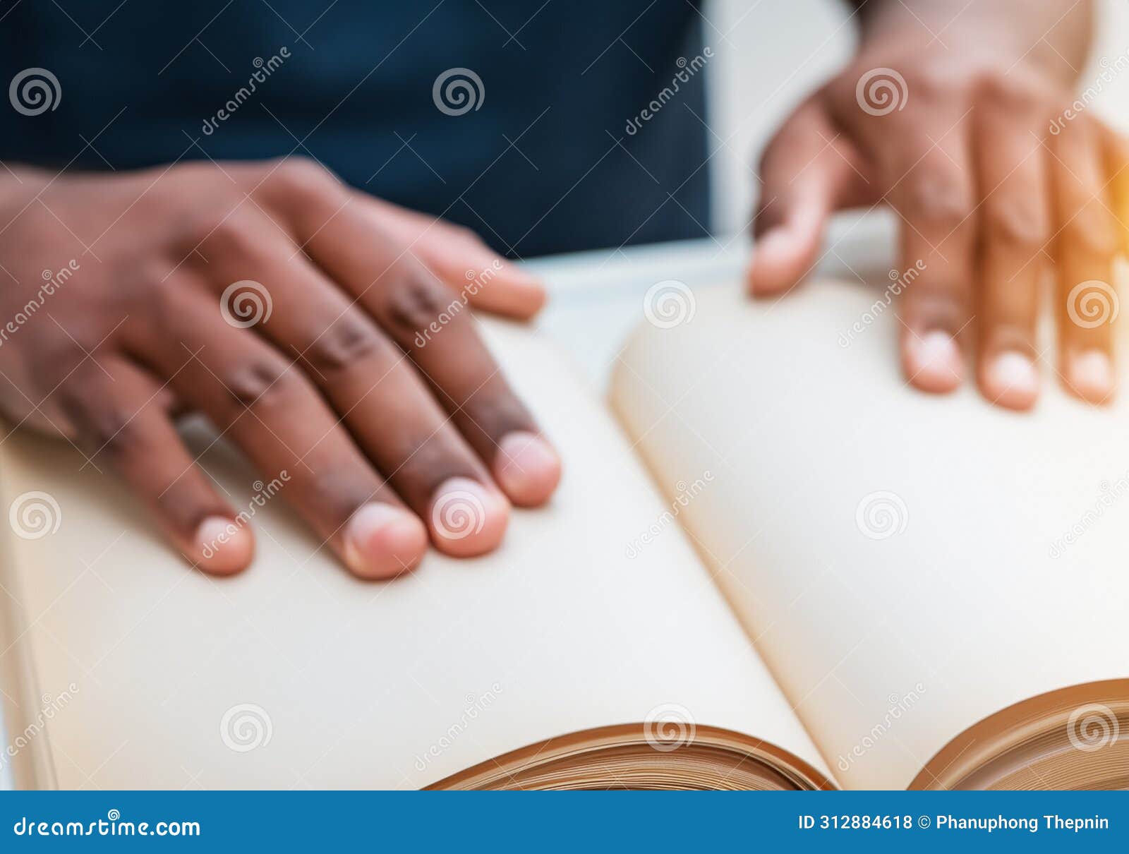 A Man Flipping Through Ancient Baptismal Certificates In The Church ...