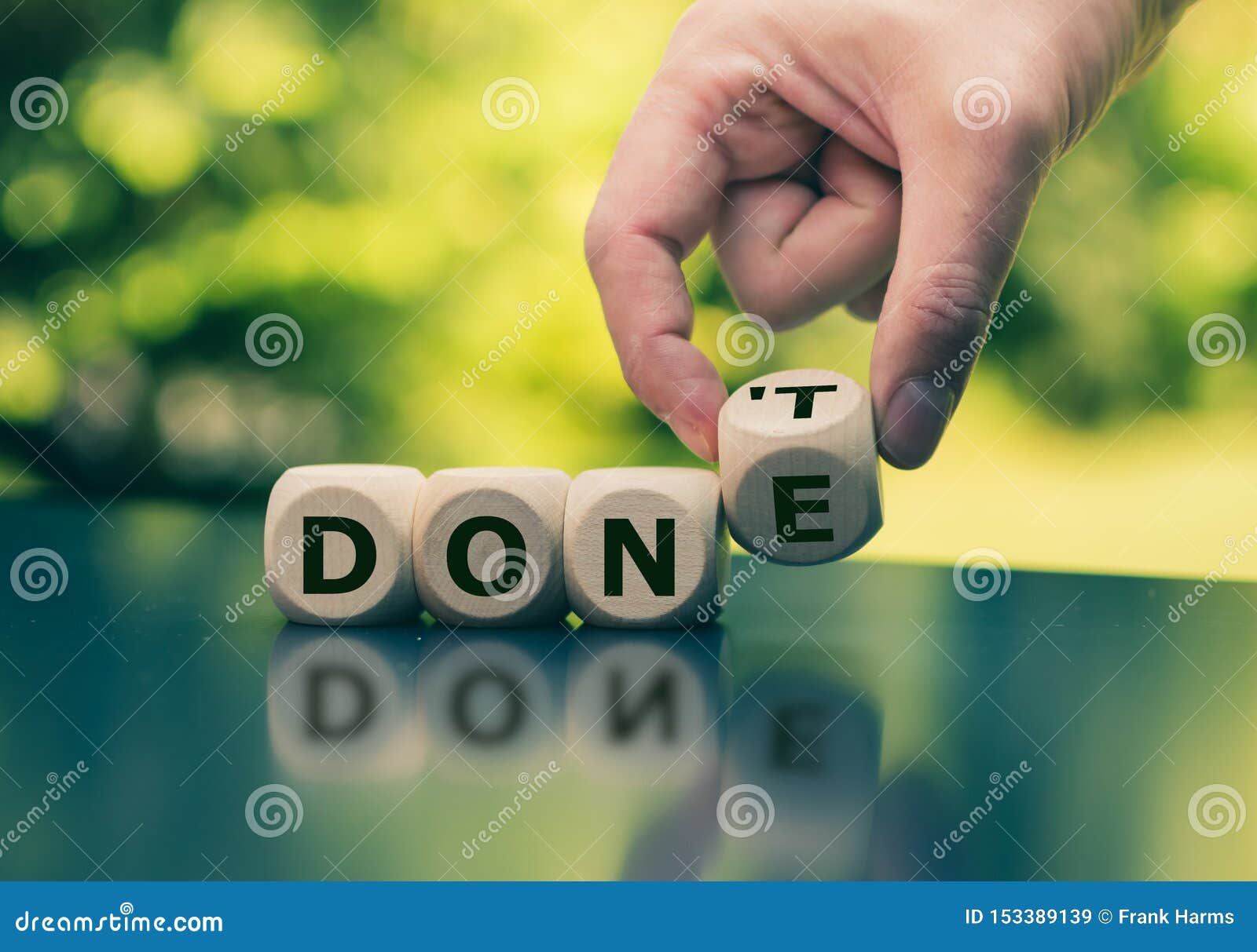 Hand Flips a Cube and Changes the Expression `don`t` To `done` Stock ...