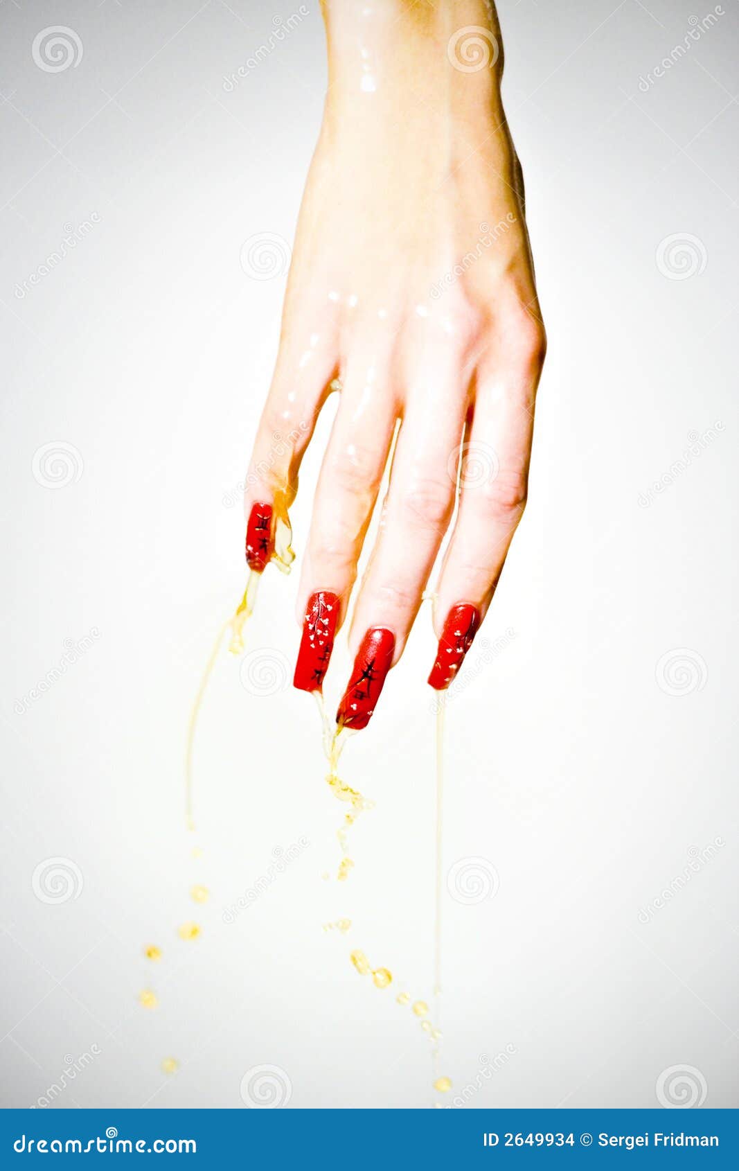 Hand with flowing down oil stock photo. Image of beautiful - 2649934