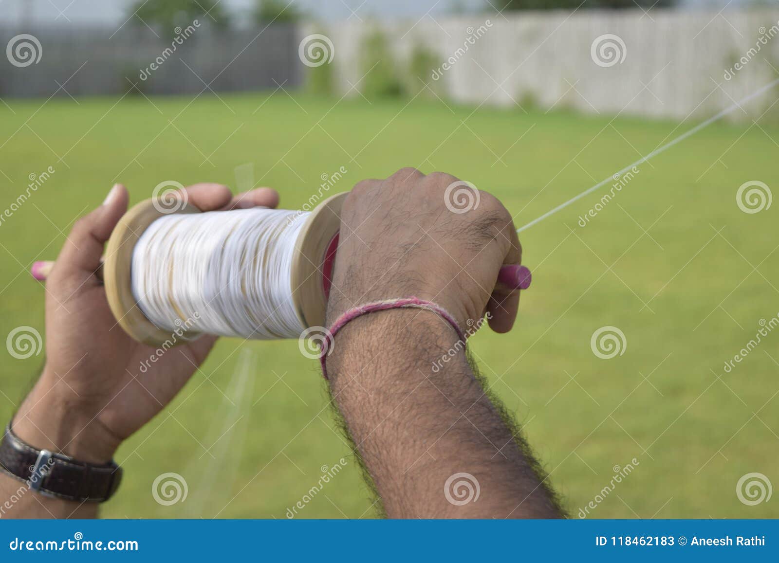 Hand Flying Kite Holding Thread on a Grassland Stock Image - Image of ...