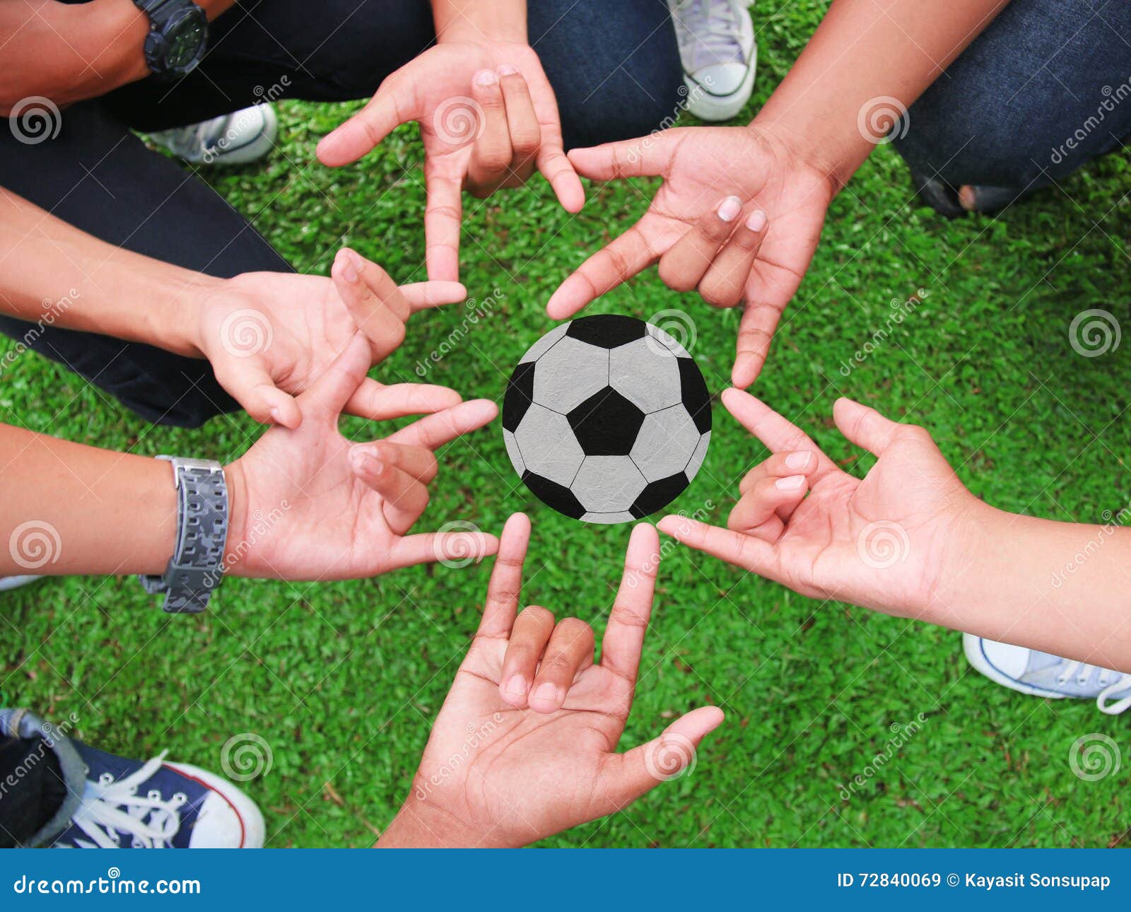 Hand, football stock image. Image of friendship, grassy - 72840069