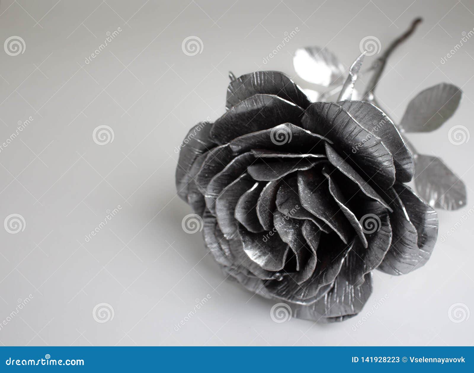 Hand Forged Rose. Rose Handmade Forged from Metal on a White Back Stock ...