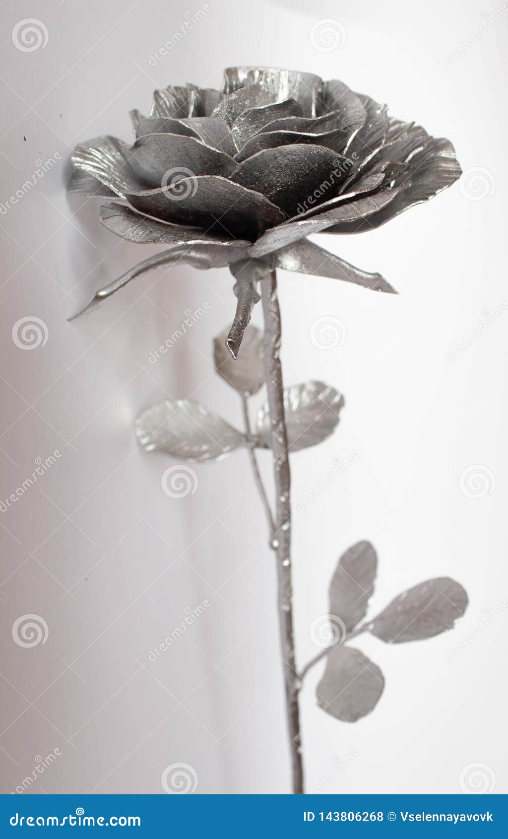 Hand Forged Rose. Rose Handmade Forged from Metal on a White Back Stock ...