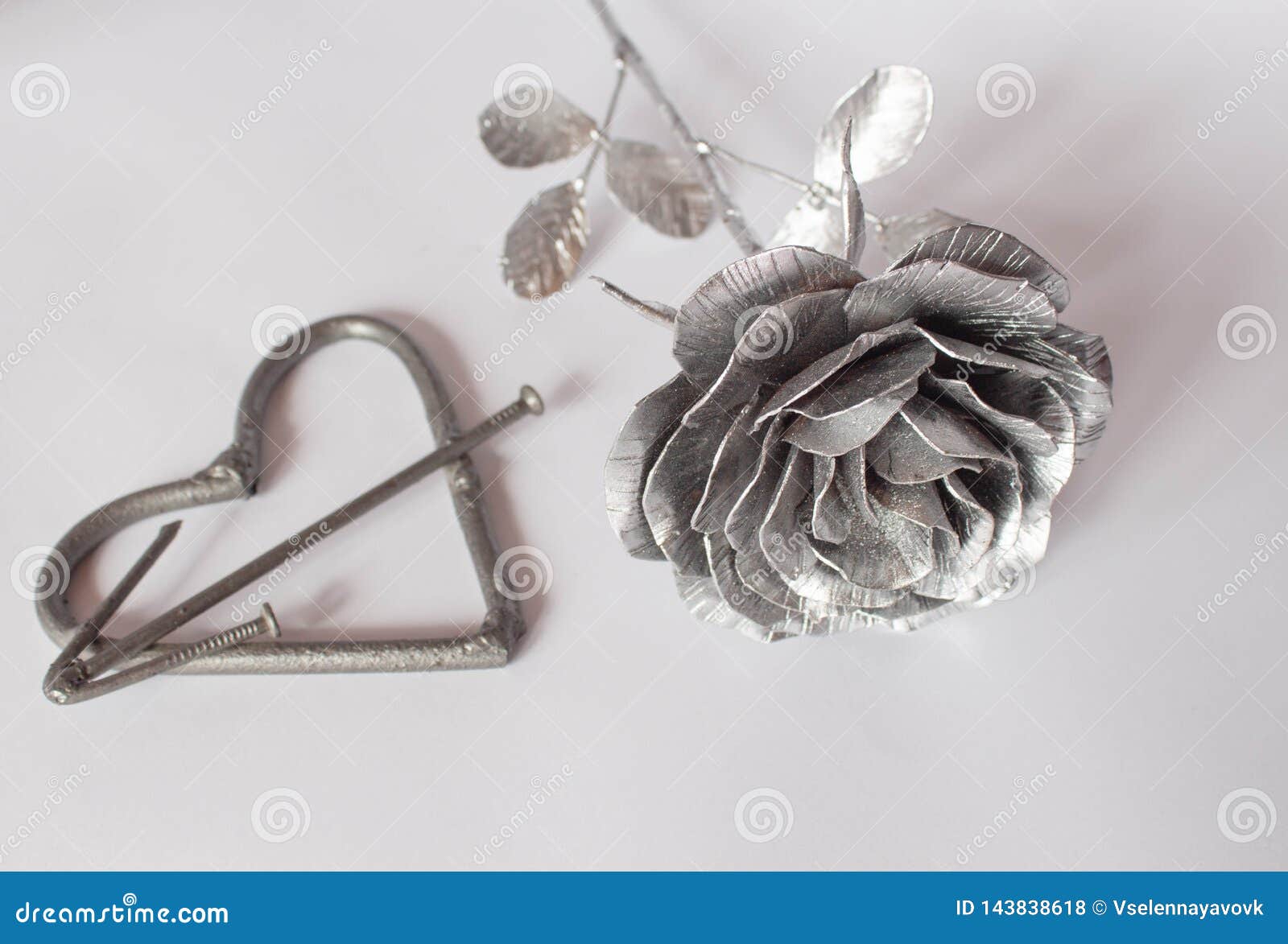 Hand Forged Rose. Rose Handmade Forged from Metal on a White Back Stock ...