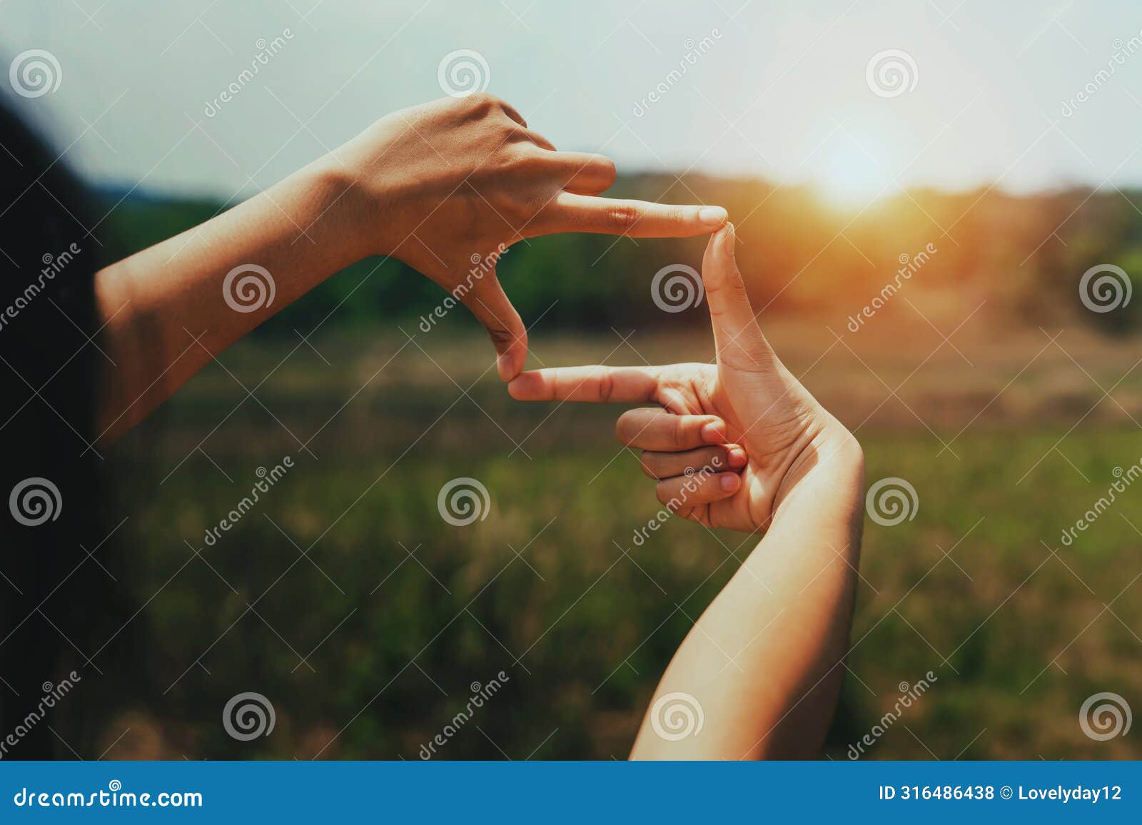 Hand Framing View Distant Over Sunset on Mountain Stock Photo - Image ...
