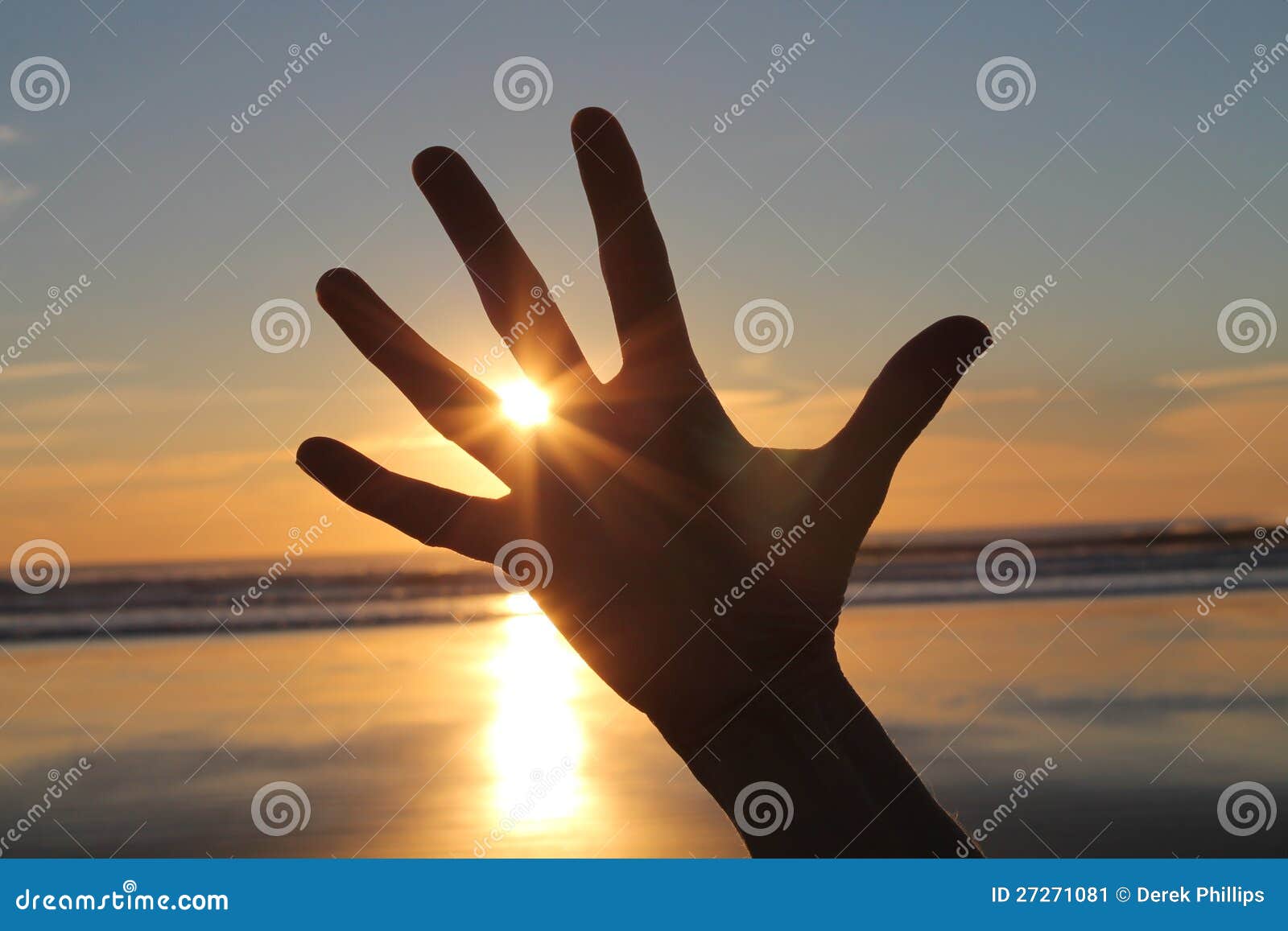 Hand in Front of Sunset stock image. Image of nature - 27271081