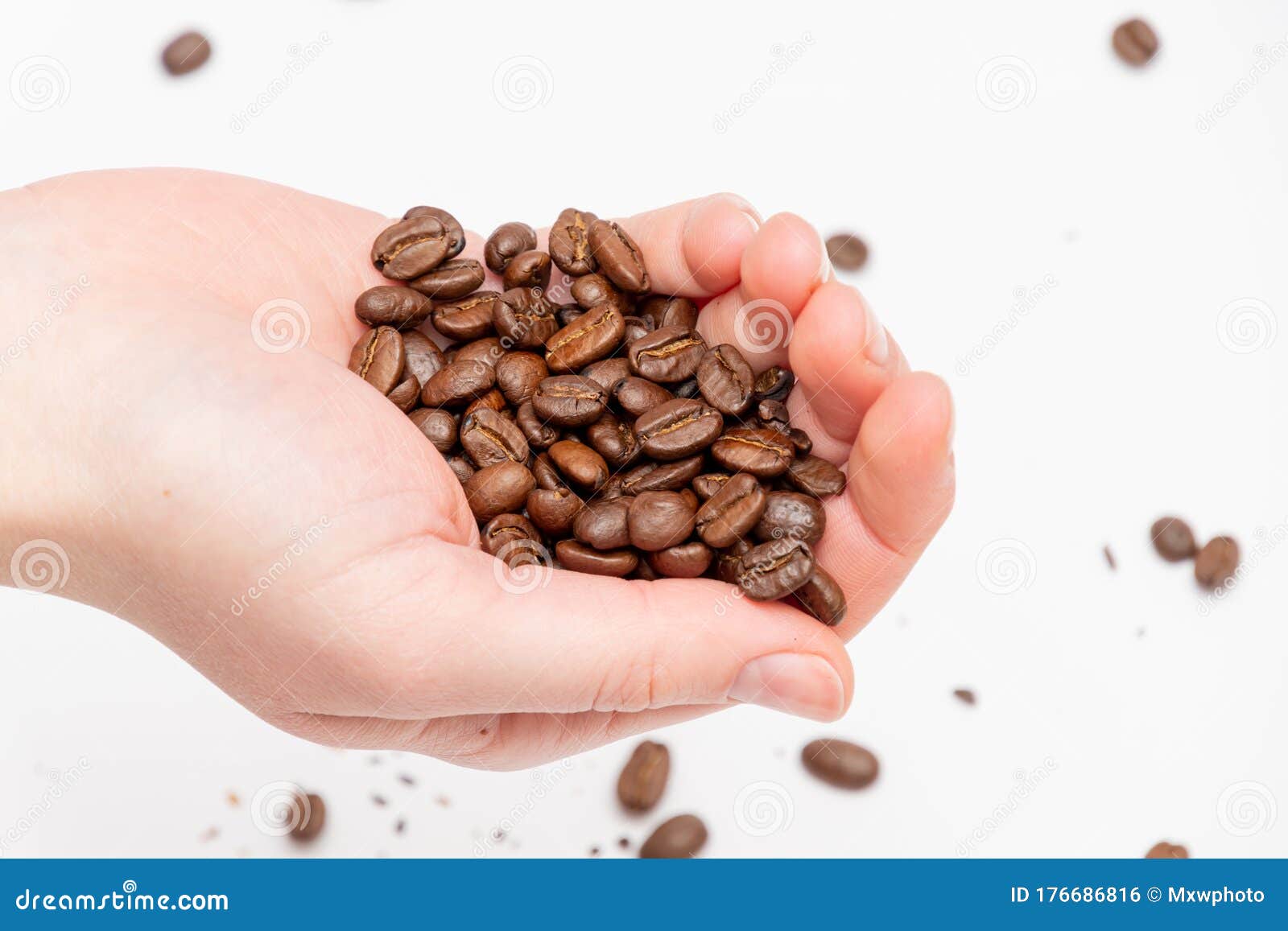 Hand Full of Fresh Roasted Coffee Beans Moving Beans in Hand Stock ...