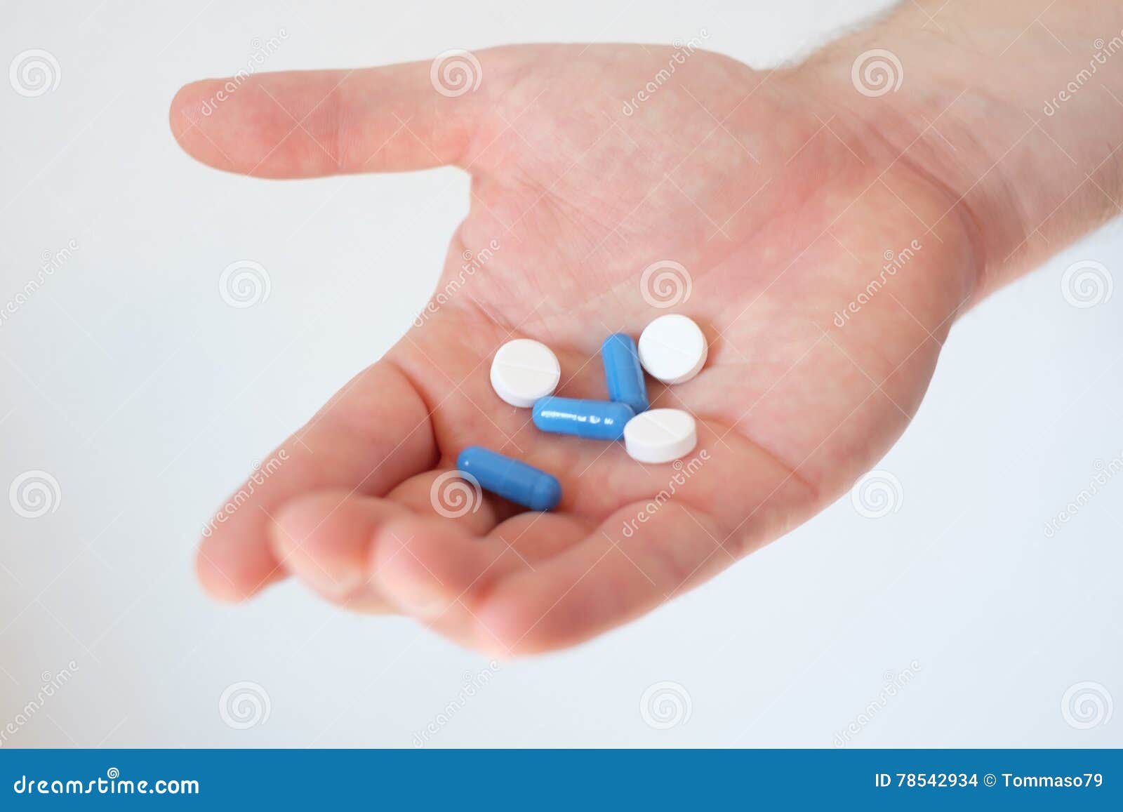 A hand full of pills stock photo. Image of group, clinic - 78542934