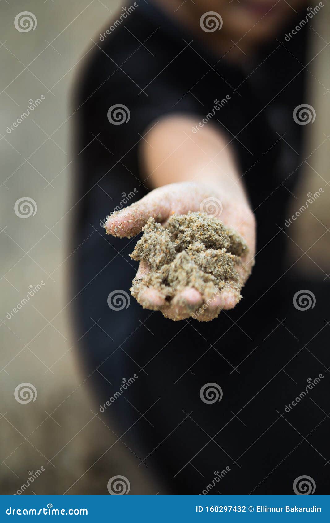 A hand full of sand stock photo. Image of hand, fashion - 160297432
