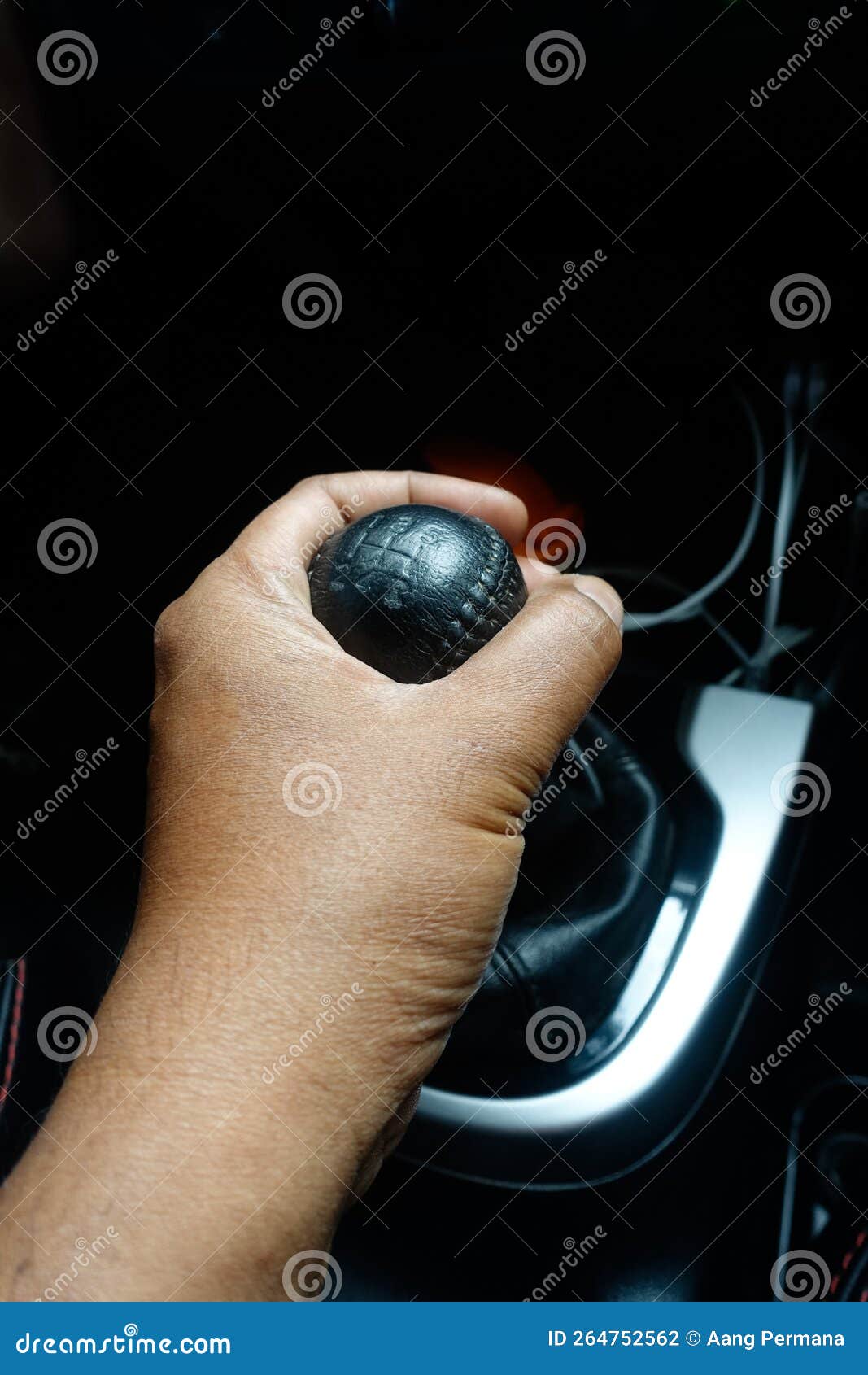 Hand on gear shift knob. stock photo. Image of limb - 264752562