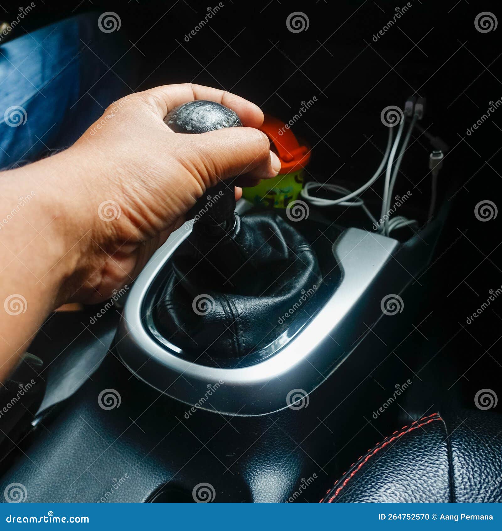 Hand on gear shift knob. stock photo. Image of design - 264752570