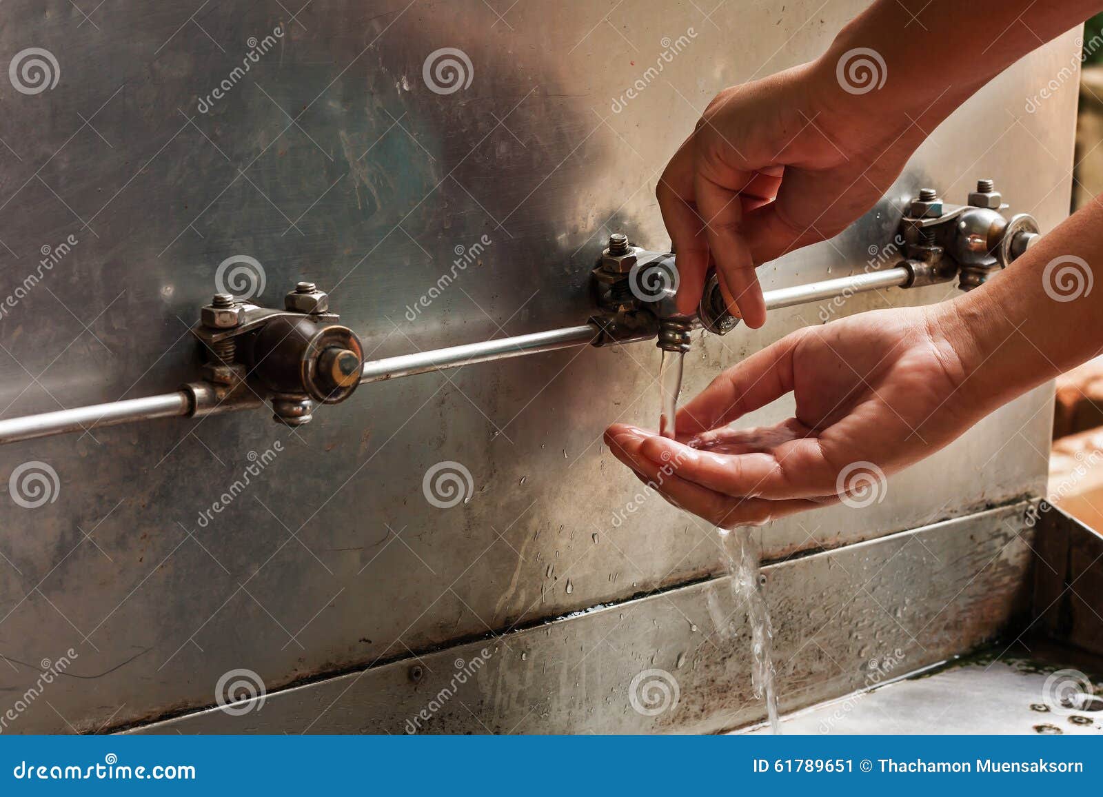 Hand girl press water stock image. Image of equipment - 61789651
