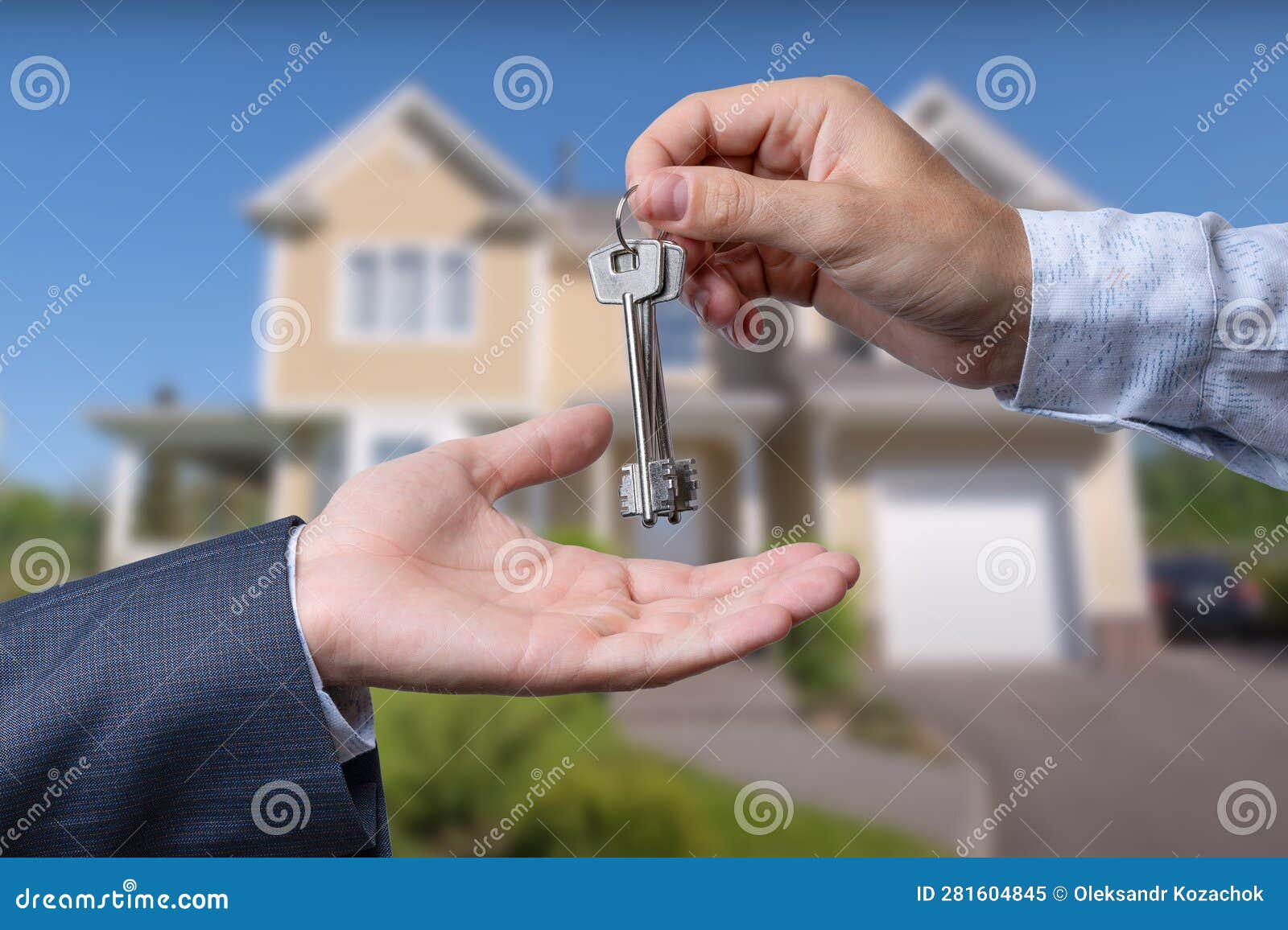 A Hand Giving a Key To Another Hand. House in the Background. Stock ...