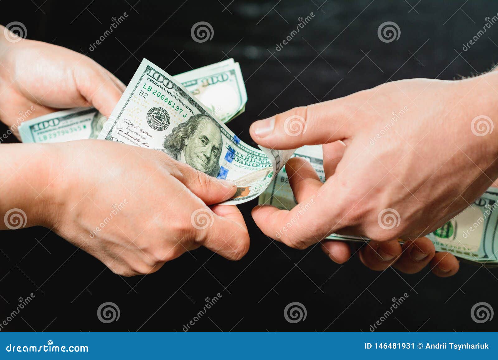 The Hand, Giving Money, is Isolated on a Black Background Stock Image ...