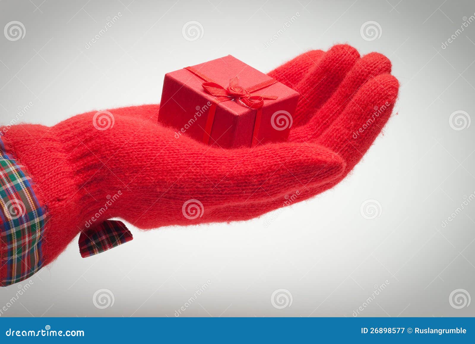 Hand Giving Present Over Grey Stock Image - Image of xmas, winter: 26898577