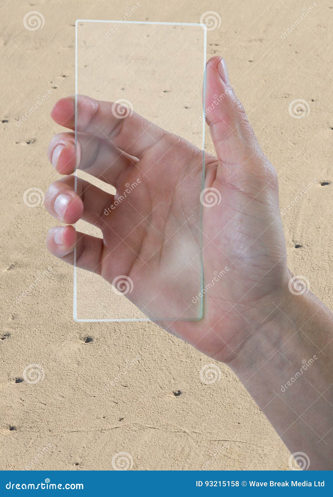 Hand with Glass Device Against Sand Stock Photo - Image of screen ...
