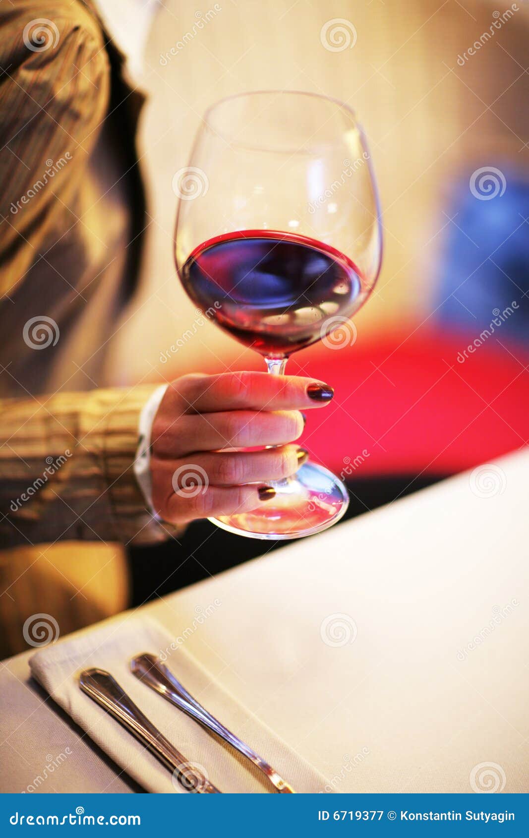 Hand glass red wine stock image. Image of closeup, table - 6719377