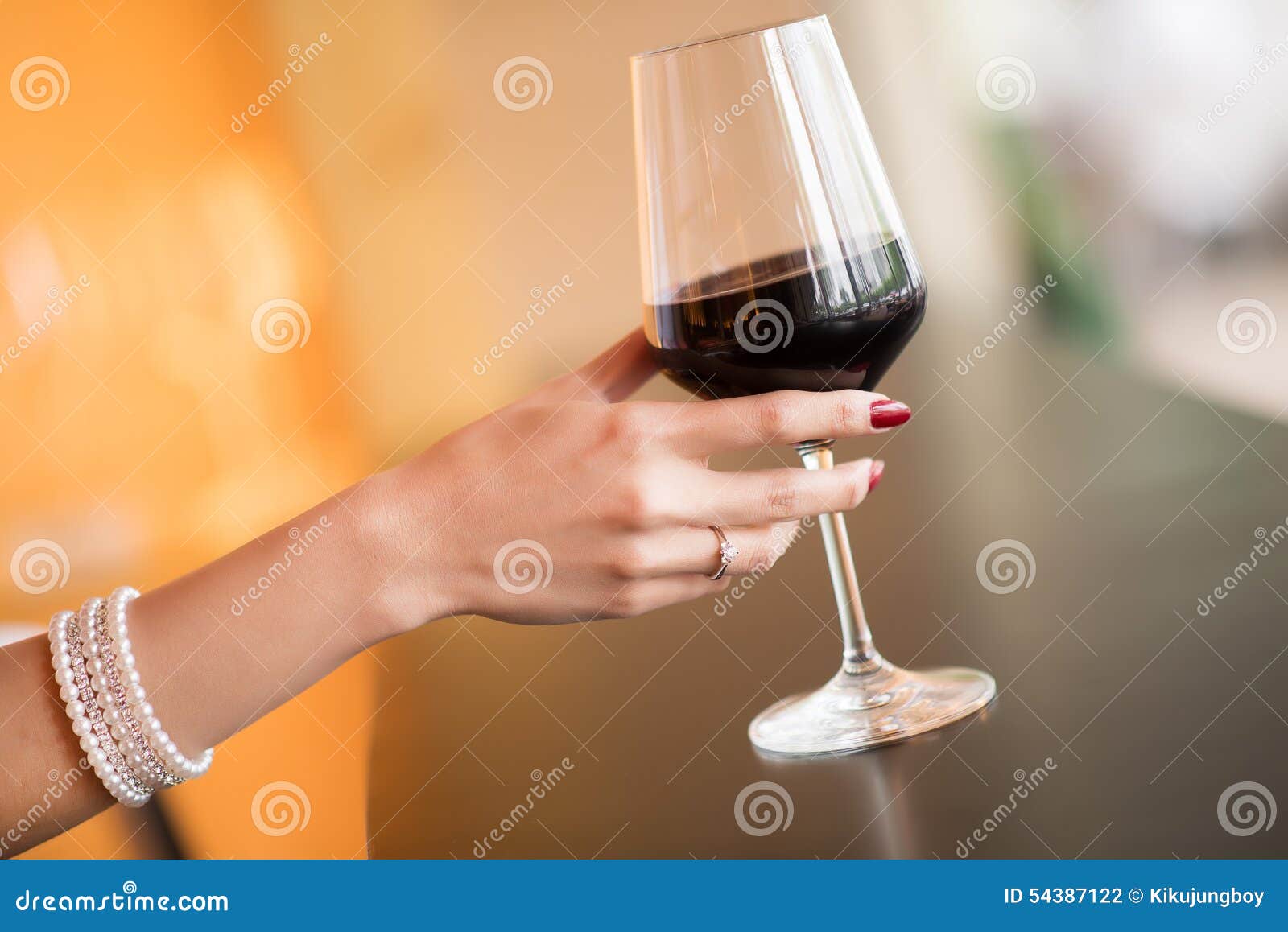Hand with a glass of wine stock photo. Image of leisure - 54387122