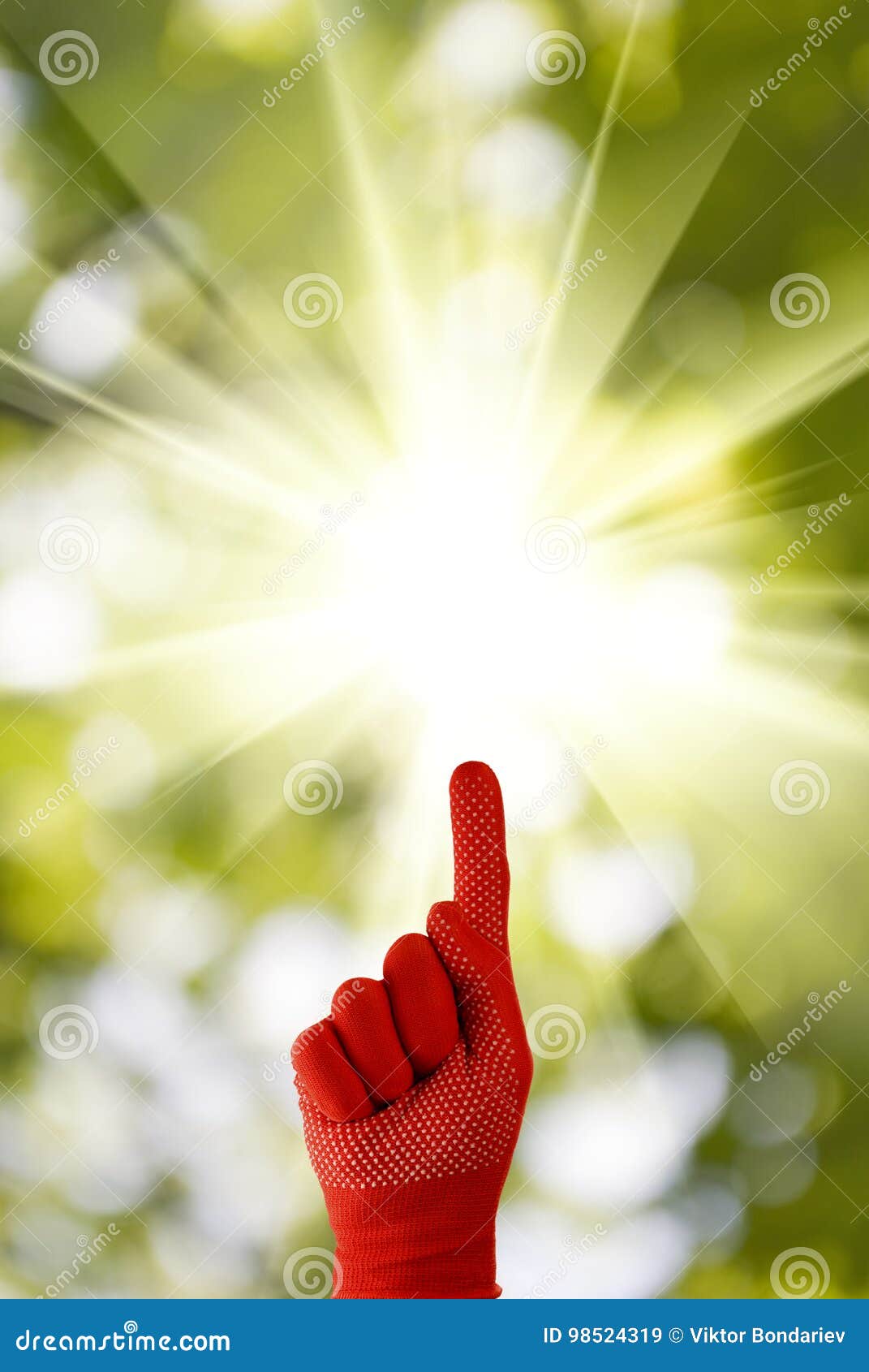 Hand in the Glove Against Sun Rays Background Close-up Stock Image ...